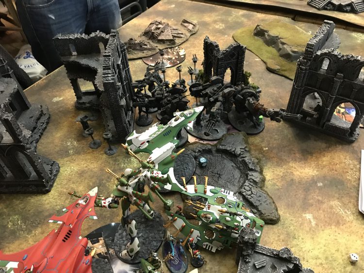 Tau robots stare down an even bigger robot | Goonhammer